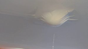 Demystifying Water Bubbles in Ceilings: Causes and Solutions